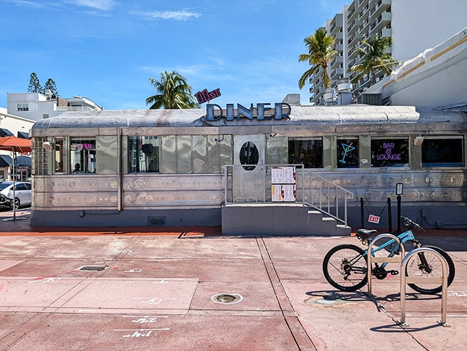A postcard-perfect view that says "Welcome to Miami" with a side of diner charm. Even the bicycle wants to stop for breakfast.