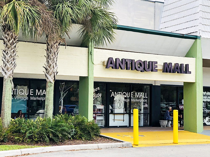 Palm trees frame the entrance like sentinels guarding a portal to the past – a distinctly Florida gateway to treasures from everywhere else.