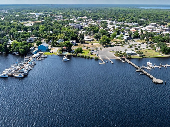 From above, Palatka reveals its perfect positioning along the St. Johns River, where boats bob peacefully and retirement dreams don't require a second mortgage.