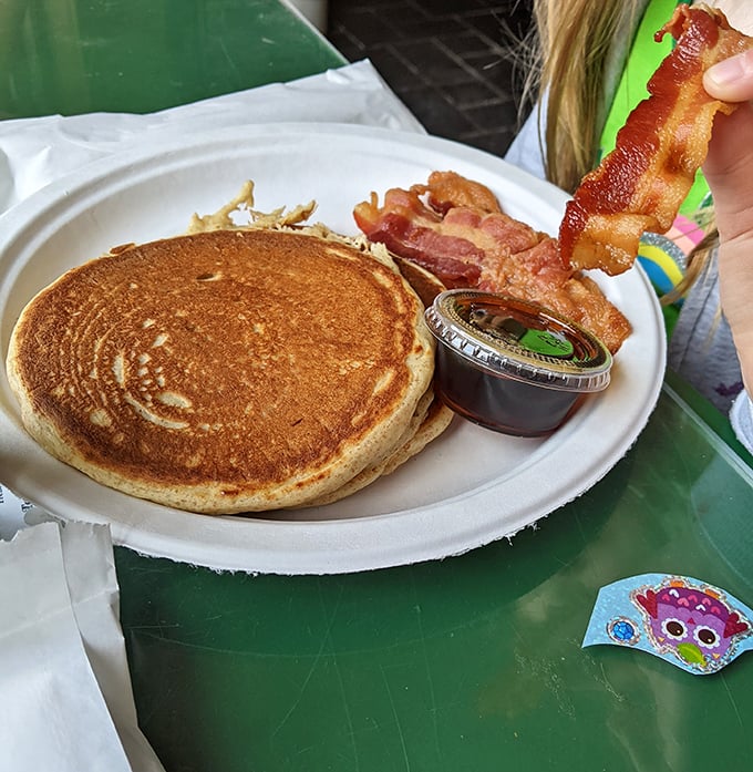 Golden pancake perfection with a side of bacon—the breakfast equivalent of a standing ovation, simple yet somehow revolutionary.