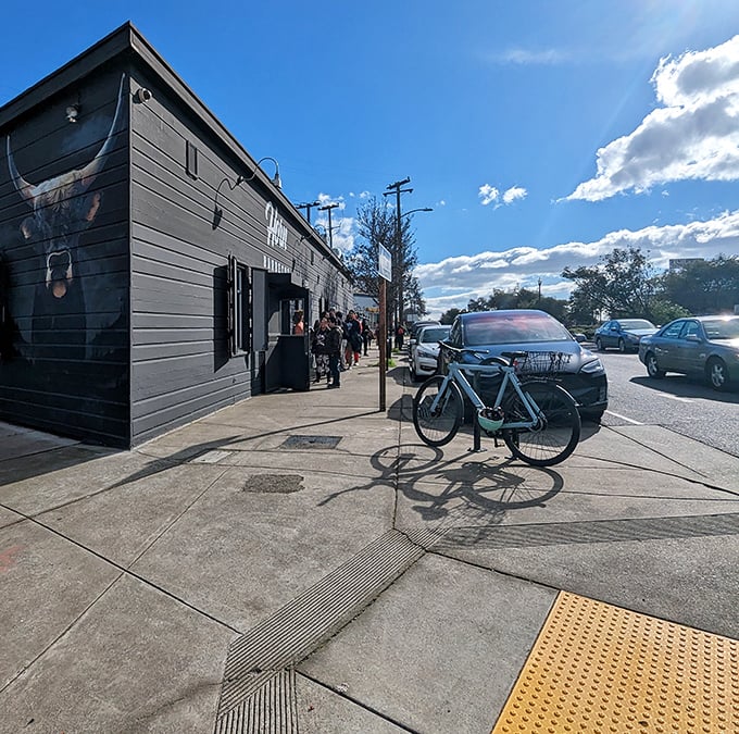 The line forms to the right, folks. That bicycle parked outside is smart—you'll want to work off some of this barbecue on your way home.