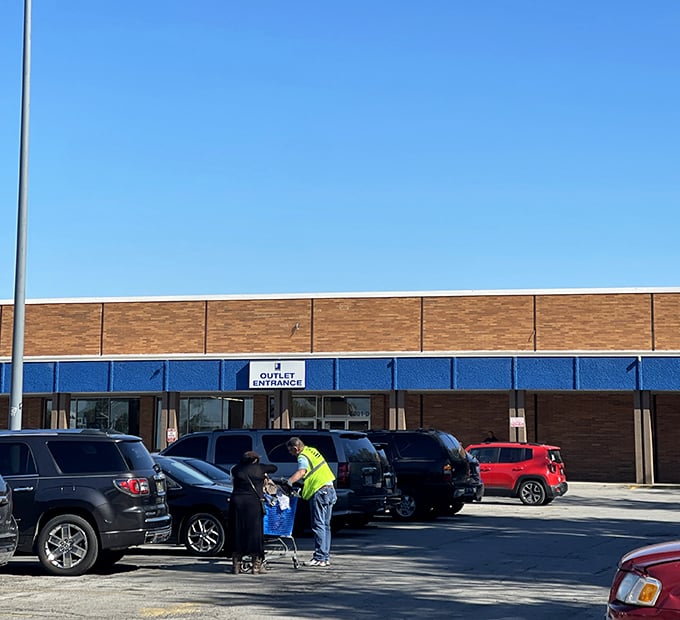 Shoppers loading treasures into waiting cars—the final act in the thrifting performance where victory is measured in trunk space.