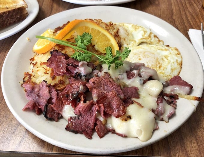 Pastrami and eggs—the breakfast of champions who plan to nap later. That melted cheese blanket turns simple ingredients into a morning masterpiece.