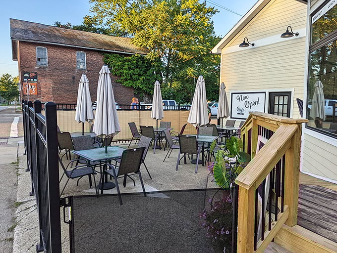 Gigi's outdoor patio awaits with tables and umbrellas, ready for those perfect Ohio days when eating outside feels like a special occasion.