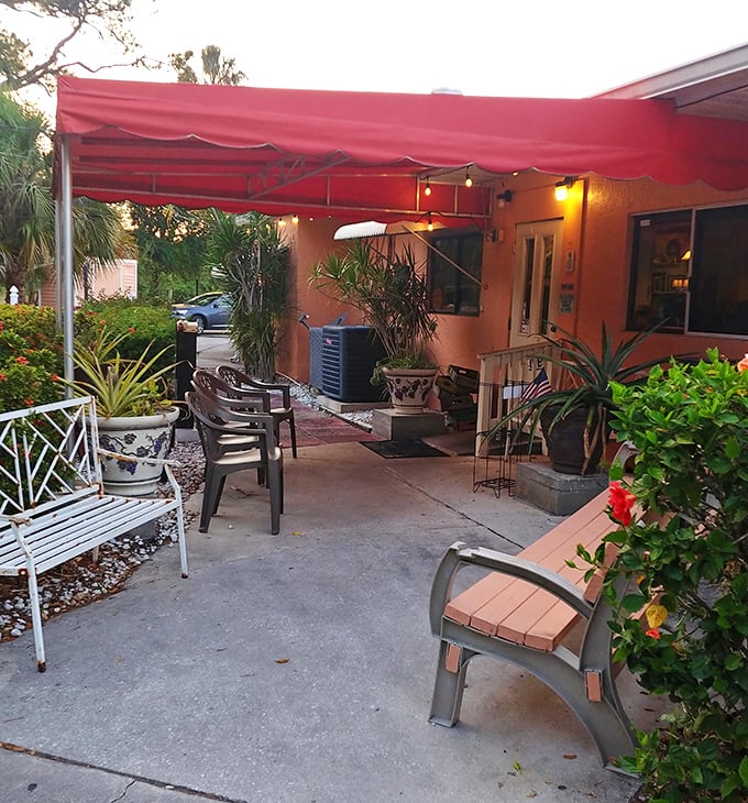 An outdoor patio where Florida breezes mix with the aroma of grilled beef in delicious conspiracy.