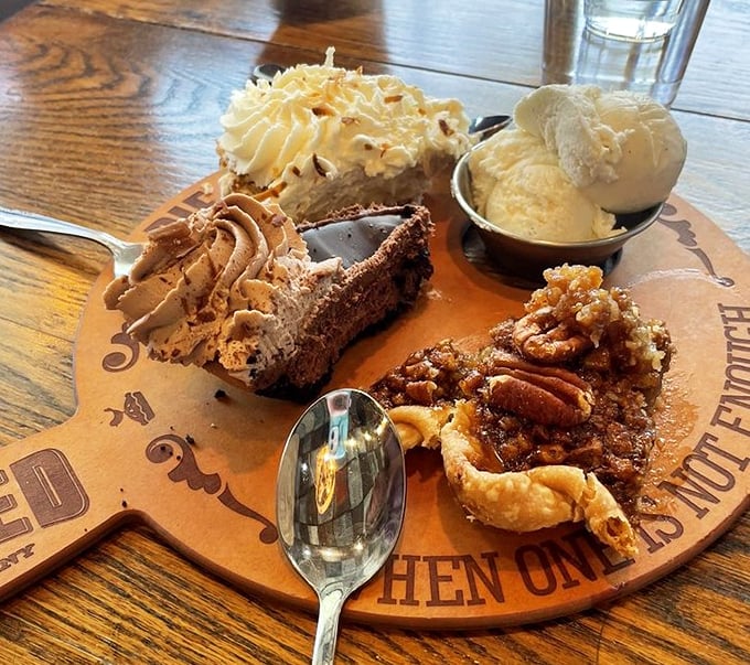 The legendary pie flight—three different slices served on a wooden board. It's not indecision; it's strategic pie sampling at its finest.
