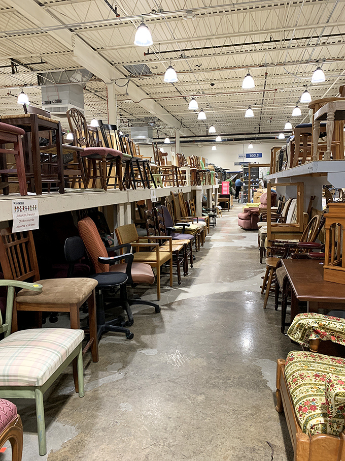 Chair parade! This aisle of seating possibilities offers everything from "distinguished professor's office" to "cozy grandmother's kitchen" aesthetics.