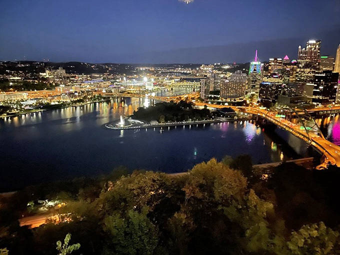 Pittsburgh's skyline at night from Le Mont's vantage point – three rivers of light flowing between buildings. Worth every penny.
