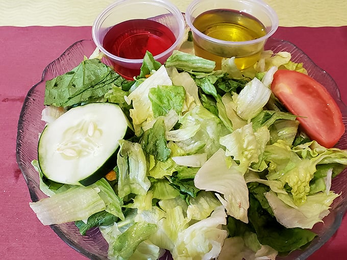 Even the side salad gets respect here – fresh, crisp, and colorful, proving that Jack's excellence extends beyond their meat and bread masterpieces.