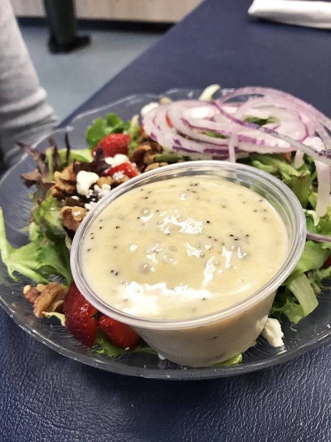 Even the salads here mean business – fresh greens, thoughtful toppings, and house-made dressing that puts bottled versions to shame.