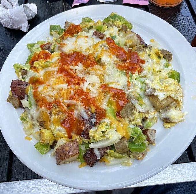 This scramble doesn't just break fast – it demolishes hunger with a perfect storm of eggs, veggies, and melted cheese.