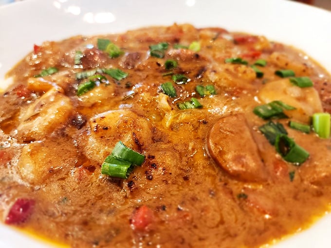 This isn't just shrimp and grits; it's a Southern hug in a bowl. Those green onions aren't garnish—they're the perfect finishing touch.