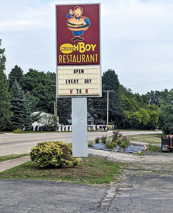 The roadside sign promises "OPEN EVERY DAY"—four words that have saved countless hungry travelers from drive-thru desperation.