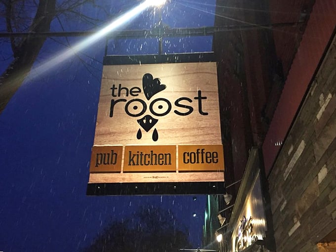 Even in snowfall, The Roost's sign glows like a beacon for hungry travelers – a North Star for those guided by their appetites.
