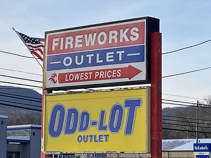 The roadside sign announces two American passions: fireworks and bargains. A patriotic shopping experience awaits.
