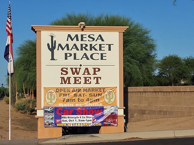 The iconic sign stands like a retail lighthouse, guiding bargain hunters to their weekend shopping destination.