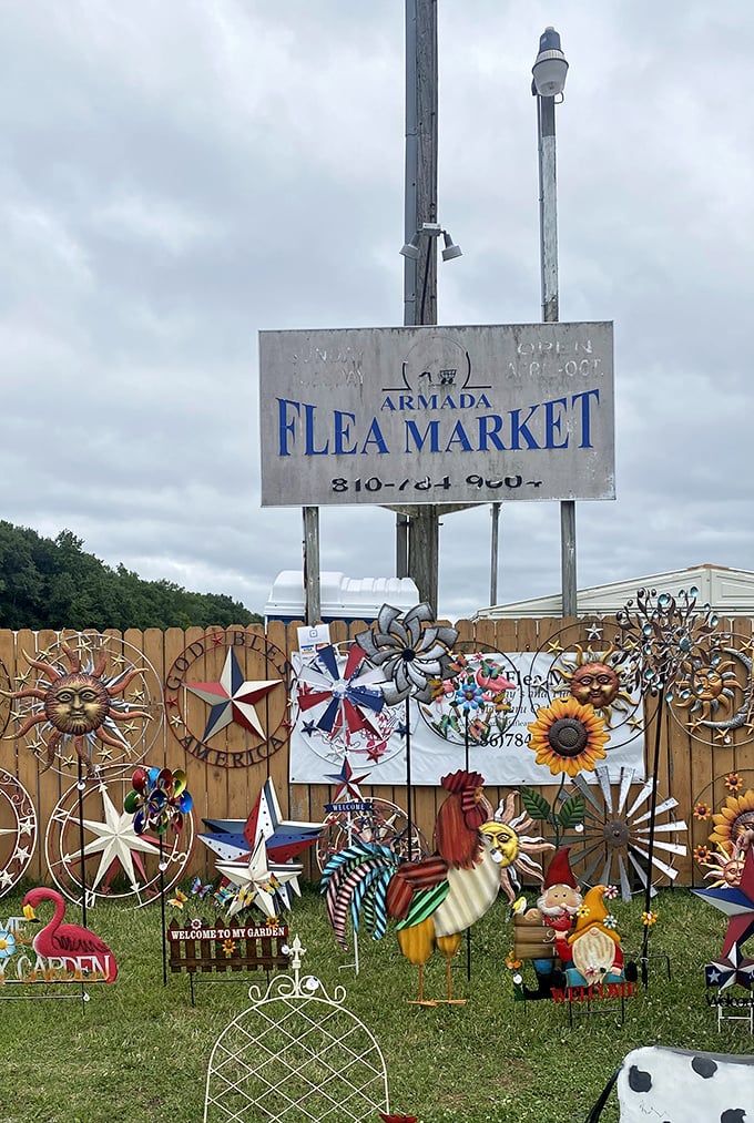The market's weathered sign stands guard over a garden of metal whirligigs and decorations—a perfect introduction to the organized chaos within.