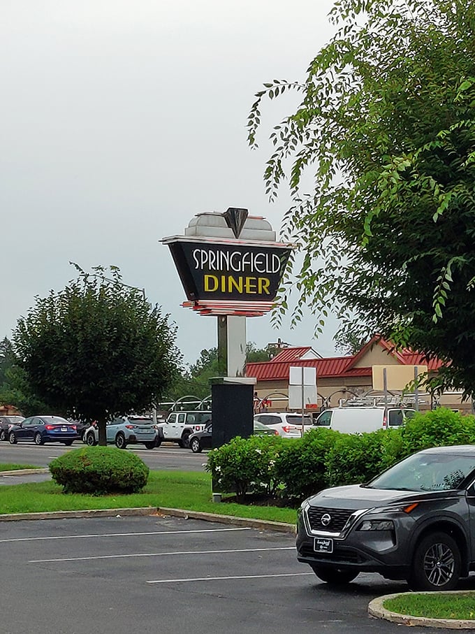 The iconic Springfield Diner sign stands tall against the Pennsylvania sky, a beacon for hungry travelers and a landmark for locals.