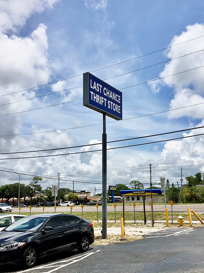 Standing tall against Florida's brilliant blue sky, the Last Chance sign promises retail therapy and environmental virtue in one stop.
