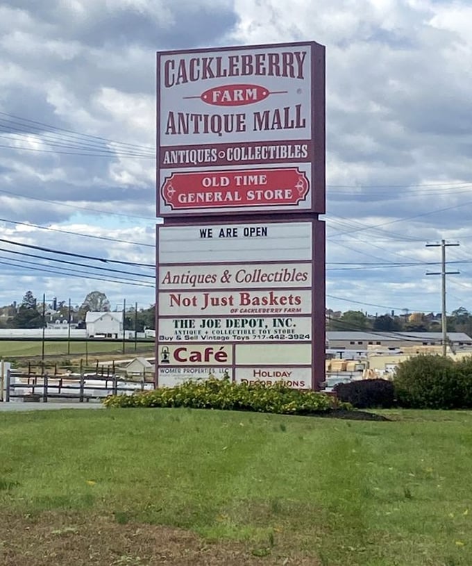 The roadside beacon for treasure hunters! This sign promises not just antiques but an experience – the "Old Time General Store" nostalgia we secretly crave in our digital world.