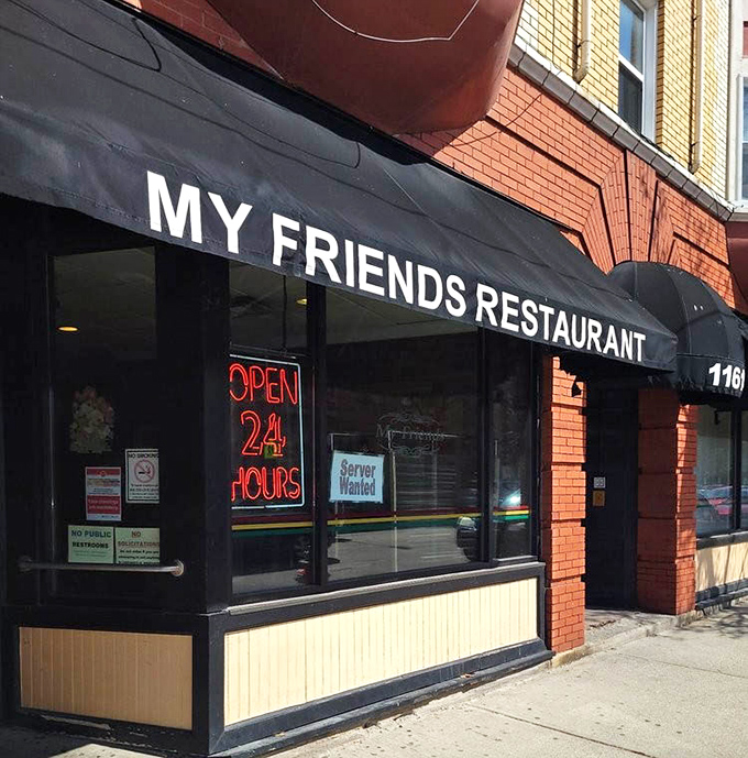 The "OPEN 24 HOURS" sign isn't just information – it's a promise that comfort food awaits, regardless of what your watch says.