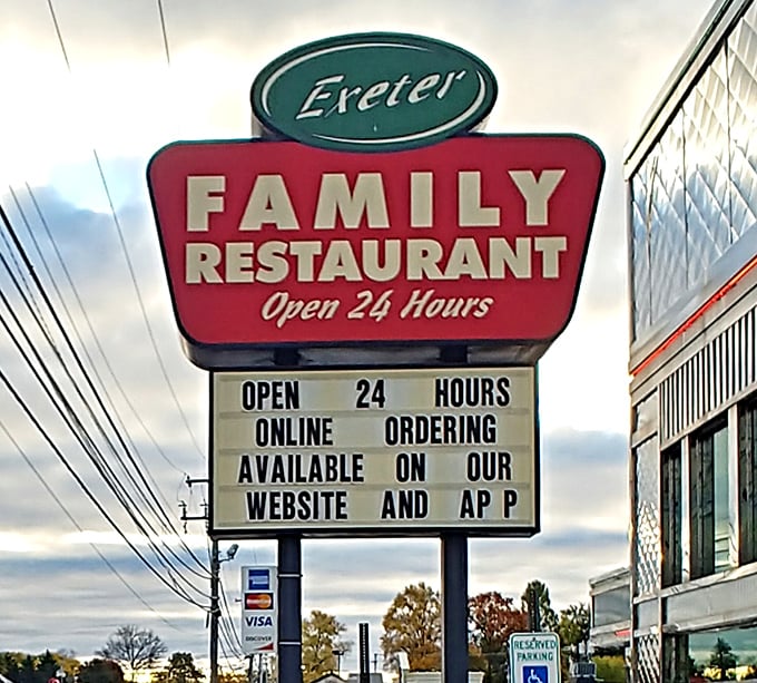 The iconic sign proclaims "Open 24 Hours"—three beautiful words that mean satisfaction is possible at 3 AM when only pancakes can heal your soul.