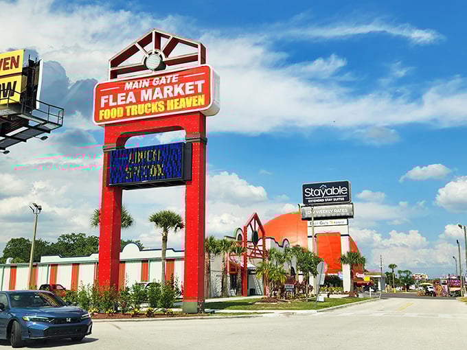 The towering Main Gate sign announces "Food Trucks Heaven" – because hunting for deals works up an appetite that only street food can satisfy.