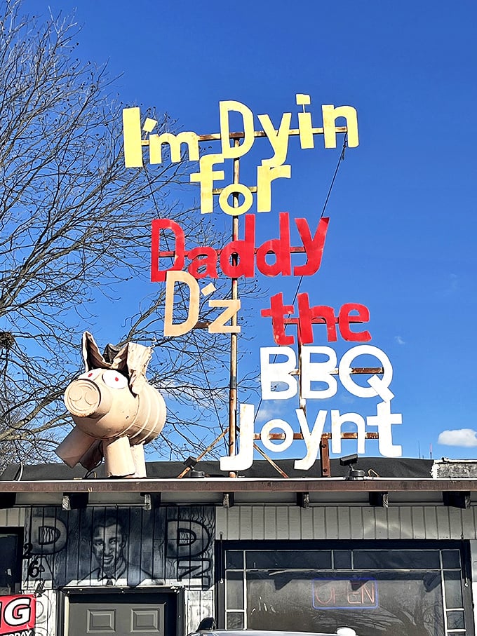 "I'm Dyin' for Daddy D'z"—the most honest restaurant sign in America. That pig knows exactly what you're thinking as you approach.