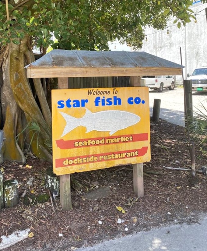 A sign that promises exactly what it delivers. No fancy marketing needed when your seafood speaks for itself at this beloved dockside eatery.