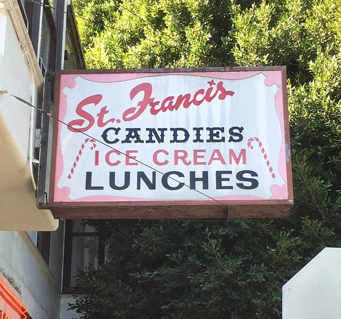 The vintage sign promises three essential food groups—candies, ice cream, and lunches—a trifecta of deliciousness that's been drawing San Franciscans for generations.