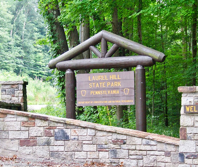 The entrance sign welcomes visitors to Pennsylvania's best-kept secret for mountain lake recreation.