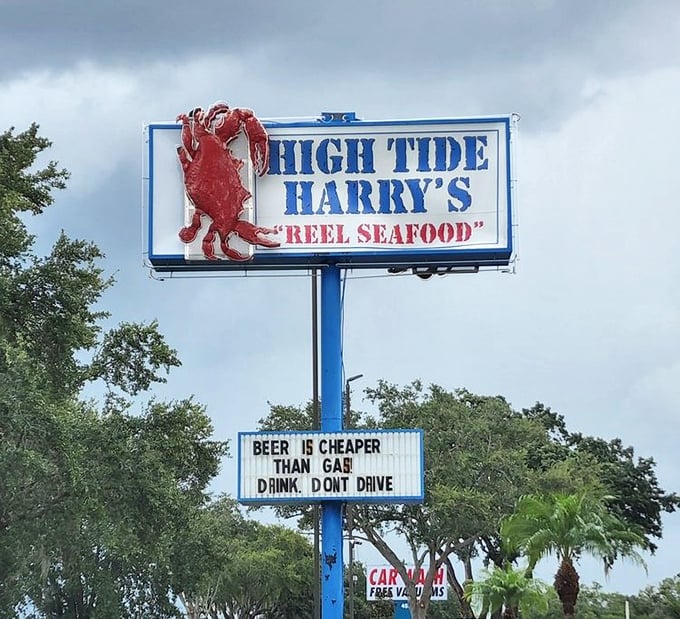 "Beer is cheaper than gas! Drink, don't drive" – a sign that delivers both humor and wisdom, much like the seafood inside delivers both quantity and quality.