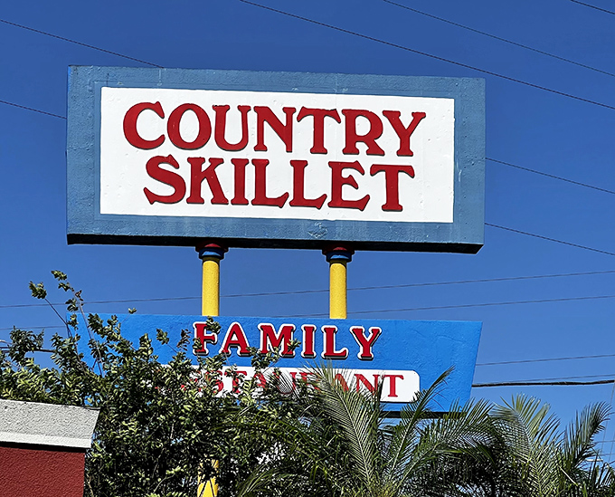 That sign against the Florida blue sky promises more than just food—it's advertising a temporary escape from life's complications.