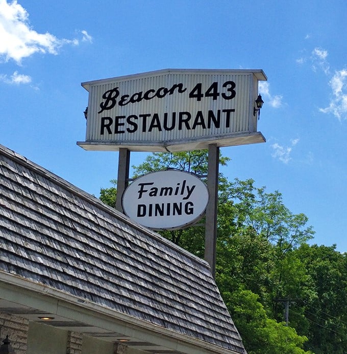The sign against a blue Pennsylvania sky – a beacon indeed, guiding hungry souls to a place where calories don't count and comfort is always on the menu.