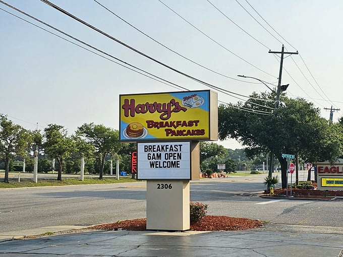 The sign that started it all – promising breakfast and pancakes like it's announcing the second coming.