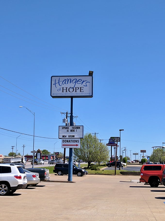Under the vast Texas sky, this sign beckons bargain hunters and do-gooders alike—a beacon of hope and hidden treasures.