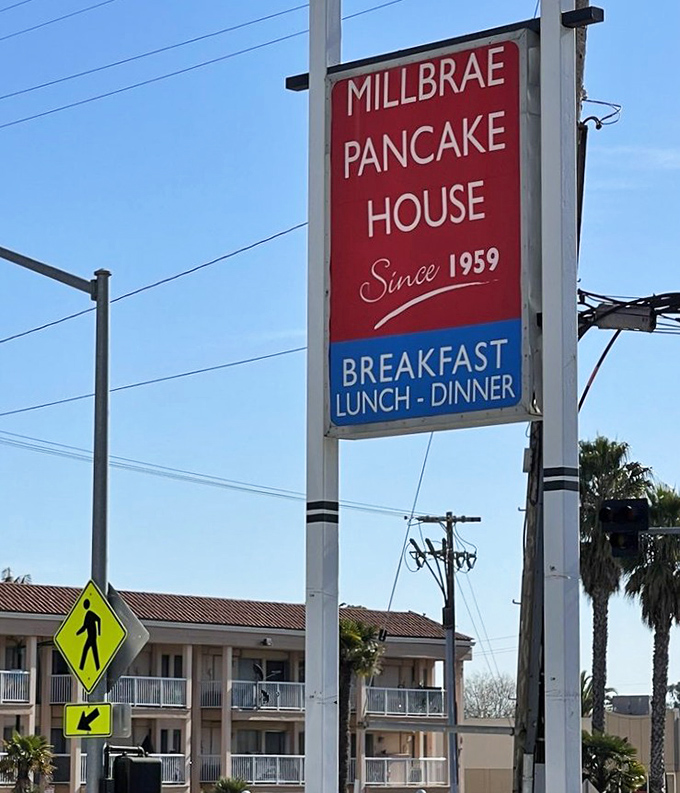 The sign promises "Breakfast, Lunch, Dinner" but we all know why you're really here – those legendary pancakes that have been flipping since 1959.