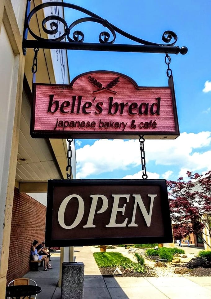 The hanging sign doesn't just say "OPEN"—it's really saying "Your diet plan ends here, but your food happiness begins."