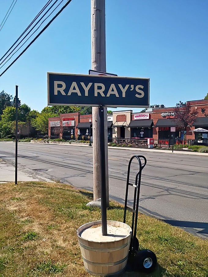 Follow this sign like it's the North Star of flavor. It's not just pointing to a restaurant—it's directing you to your next favorite meal.