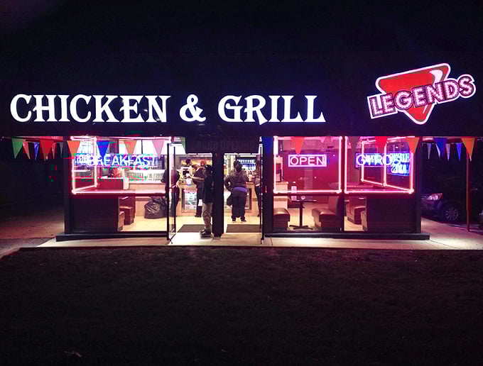 The nighttime signage doesn't whisper, it announces: "Yes, we're open, and yes, this chicken is worth staying up for."