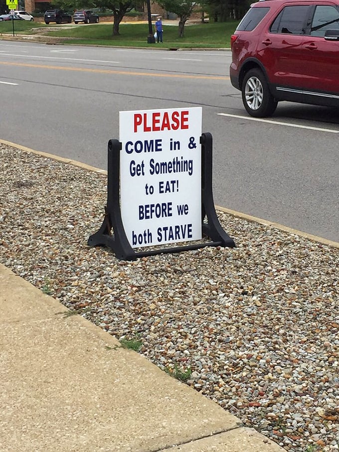 The sidewalk sign's plea for customers shows the humor that makes local spots like Smitty's so endearing. How can you resist?