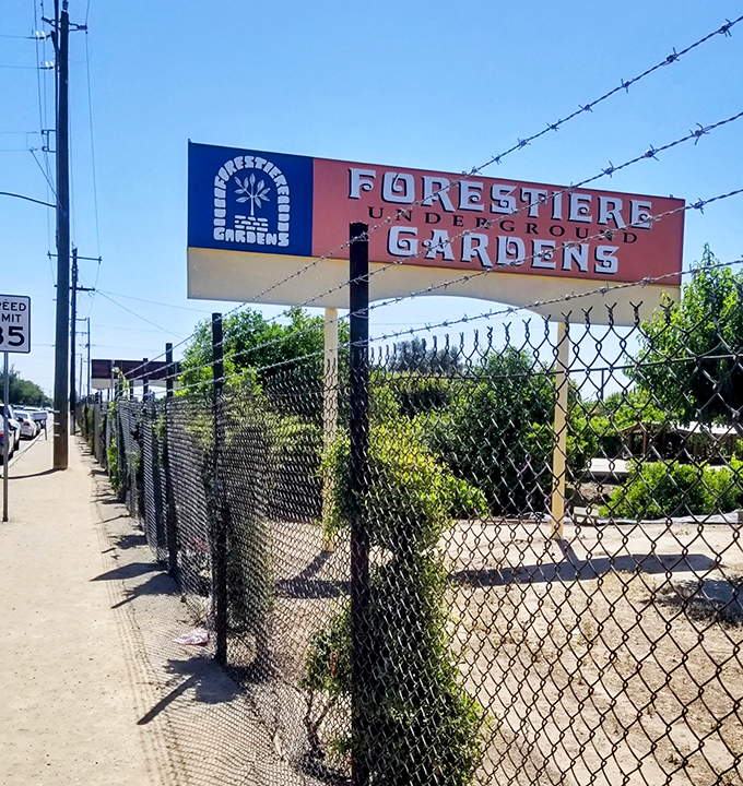 The unassuming entrance sign belies the underground wonderland that awaits. Like finding Narnia in Fresno—minus the snow, plus citrus trees.