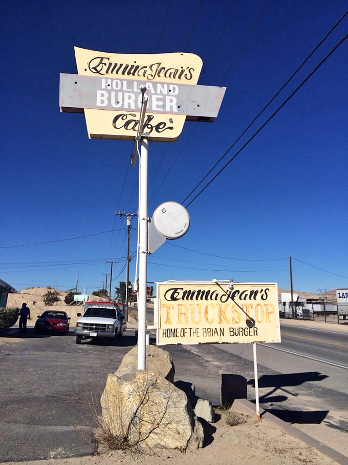 That vintage sign against the desert sky announces more than just a restaurant – it's a landmark, a destination, a promise of honest food.