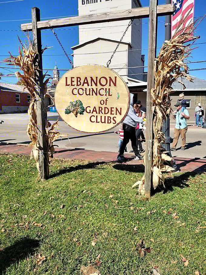 The Lebanon Council of Garden Clubs sign stands amid seasonal decorations – a testament to the community pride that helps make the railroad experience so special.