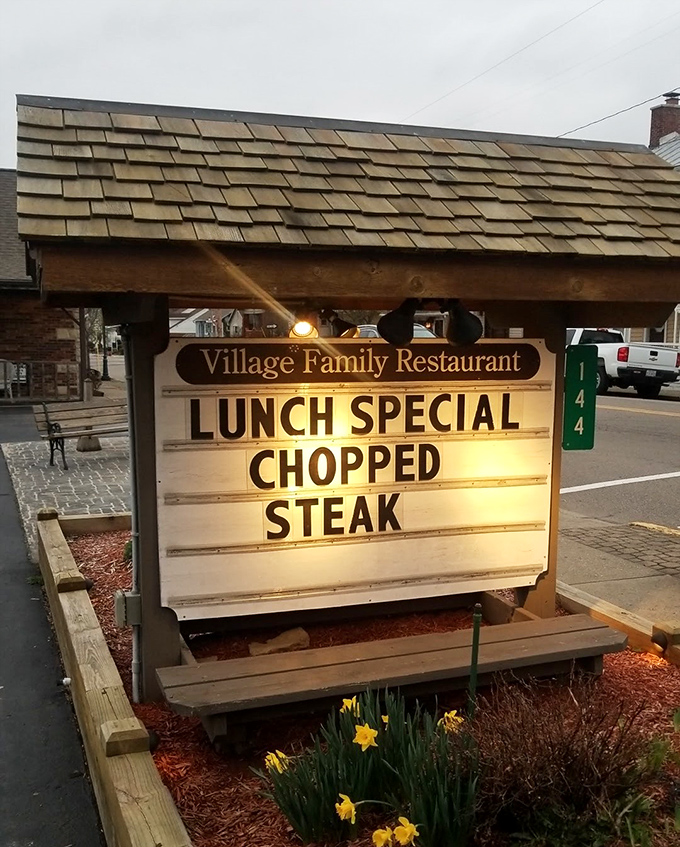 The roadside sign announcing today's special like a town crier – a beacon of hope for hungry travelers and locals alike.
