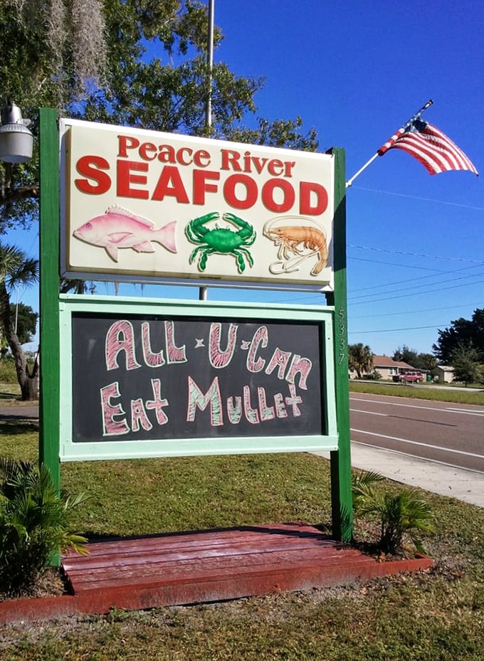 The roadside sign says it all: "ALL U CAN EAT MULLET." In Florida, that's not a hairstyle—it's a promise of seafood abundance.