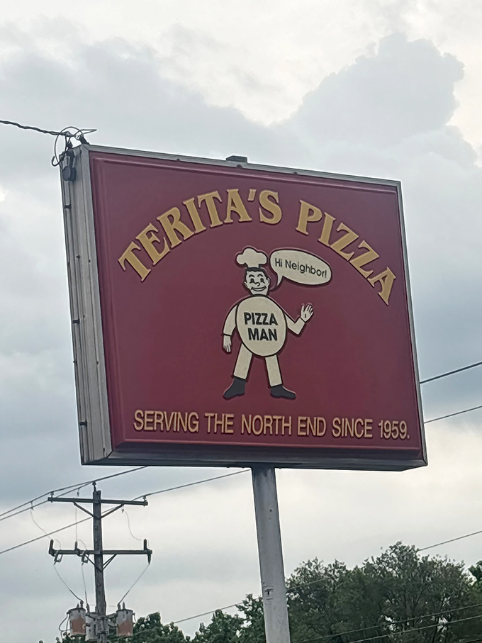 That cheerful pizza man sign has been welcoming hungry neighbors since the Eisenhower administration.