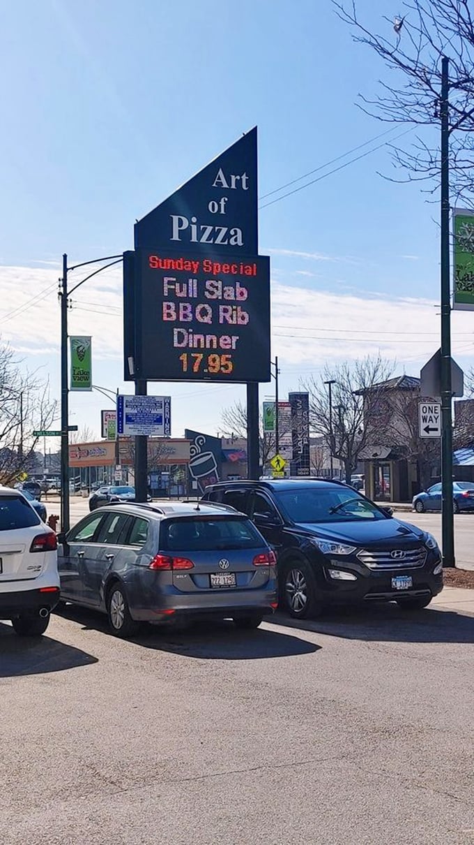 The roadside sign announces daily specials to passing traffic – a public service announcement for those in need of serious comfort food.