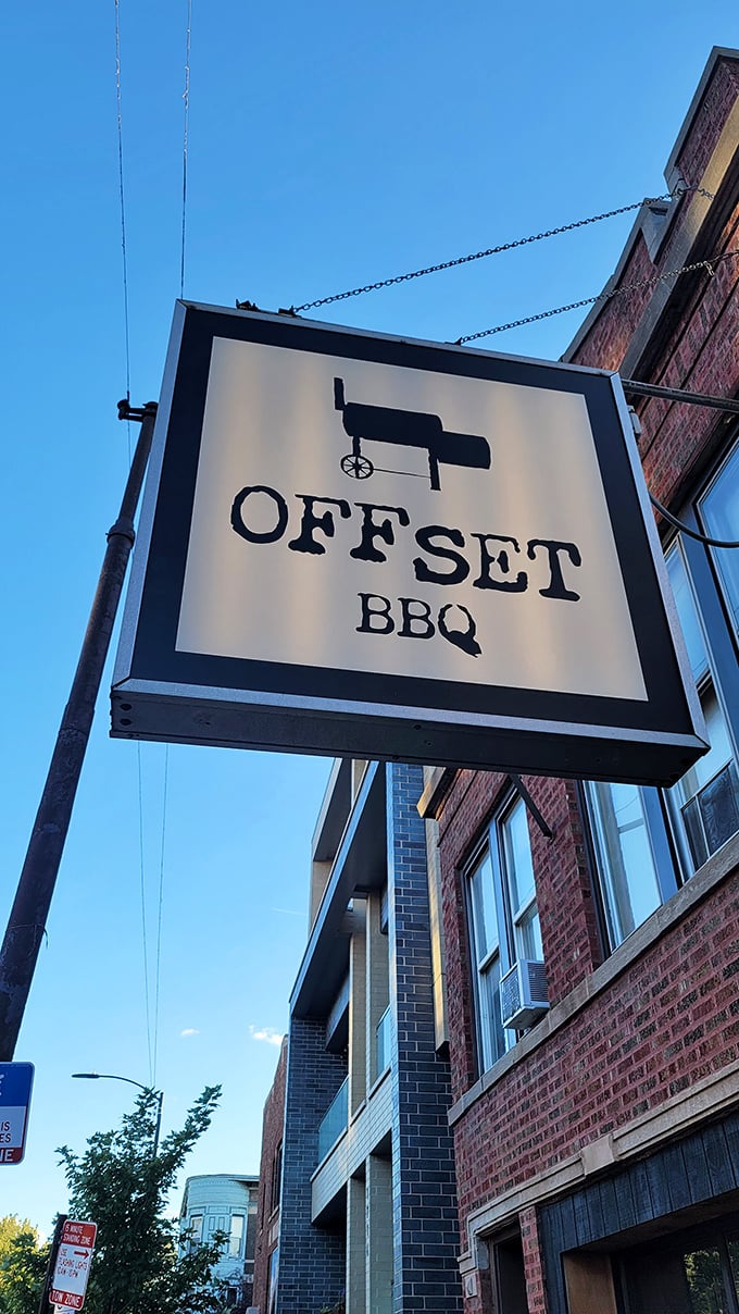 The hanging sign against a perfect blue sky – like a beacon calling to barbecue pilgrims wandering through Wicker Park in search of smoky salvation.