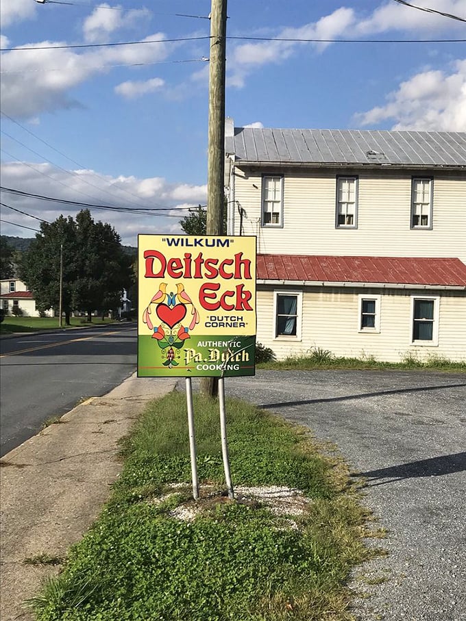 The roadside sign stands as a beacon of culinary promise with its cheerful "Wilkum" greeting. For hungry travelers, it's better than any five-star rating.